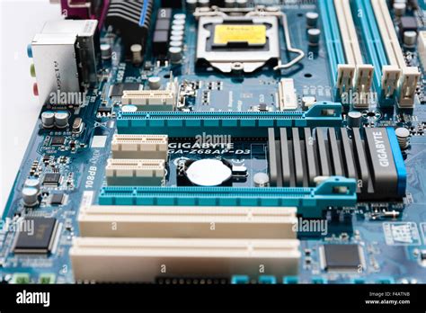 Computer Motherboard Showing Pci Expansion Slots Chip Socket And Ram