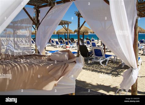 Outdoor Massage Tables On White Sand Beach At A Mayan Riviera Beach
