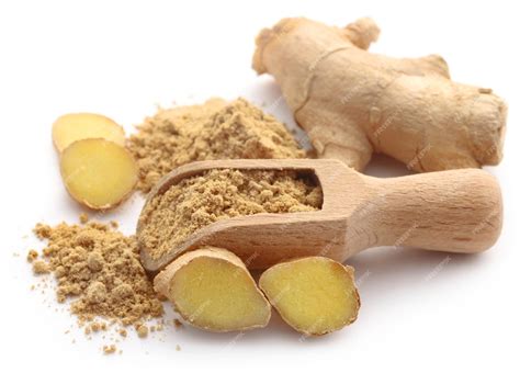 Premium Photo Ginger With Dried Powder Over White Background