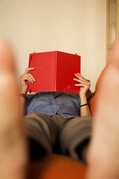 Man Lying On The Sofa Reading Stock Photo Image Of Adult Couch
