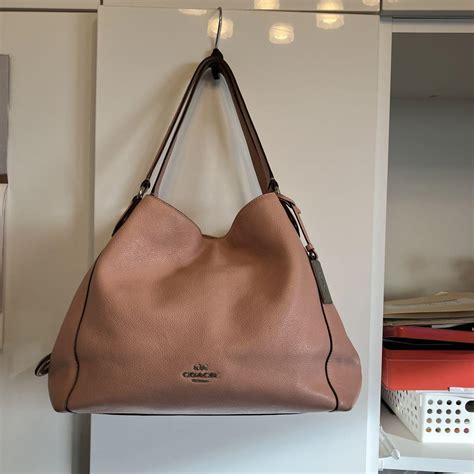 美品 コーチ ピンクバック 正規品 メルカリ