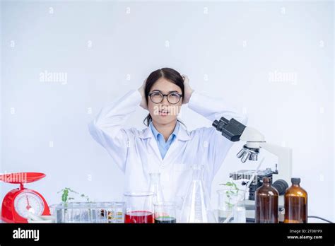 Female Scientist Laboratory Confused And Wondering About Question Stock