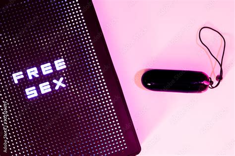 Sex Toys On A Pink Background With A Letterbox Board With Text Free Sex Top View Flat Layout