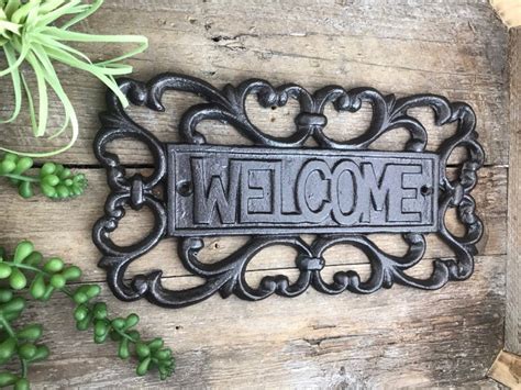 Cast Iron Welcome Sign With An Antique Bronze Finish This Etsy
