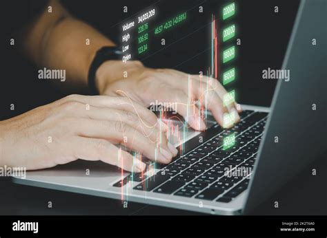 Man Hands Using Computers To Analyze Data And Investment Charts