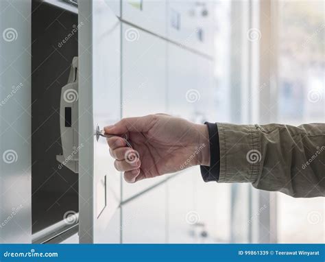 Hand With Key Open Locker In Locker Room Stock Image Image Of Storage Deposit 99861339