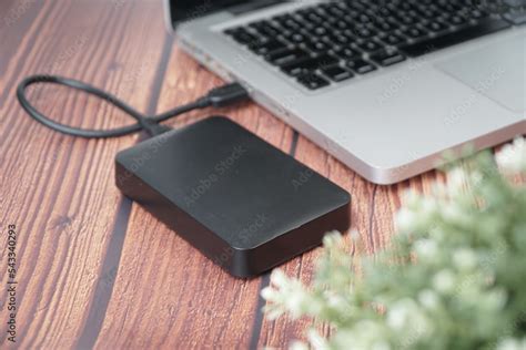 Working With External Drive Connected With Laptop Stock Photo Adobe Stock