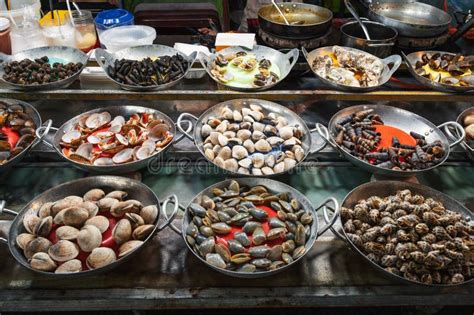 Snails And Clams At Asian Street Food Night Market In Vietnam