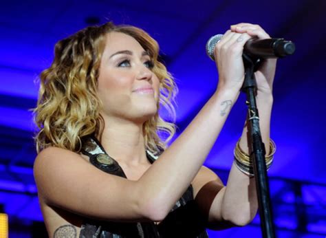 New Leaked Pics Of Miley Cyrus Causing A Buzz On The Web [photos]
