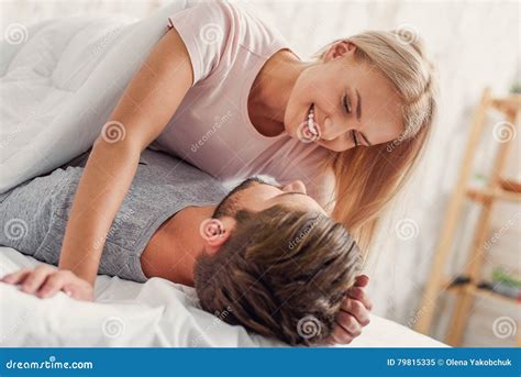 Cute Loving Couple Luxuriating In Bedroom Stock Image Image Of Female Blanket 79815335