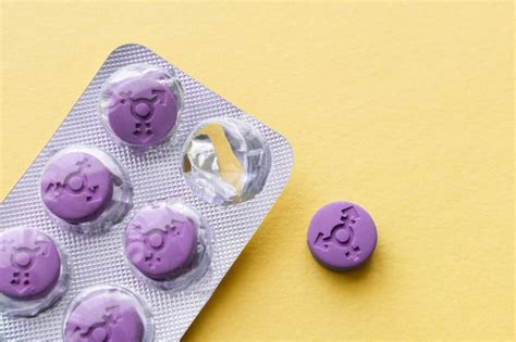 Premium Photo Transgender Pills Hormonal Pills A Purple Pill With A