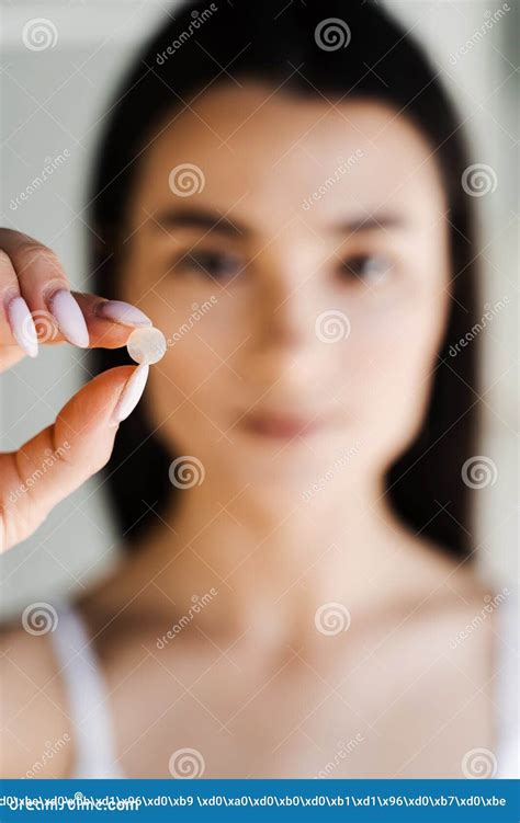 Girl With Acne Round Patch In Hand Close Up Using Acne Patches For
