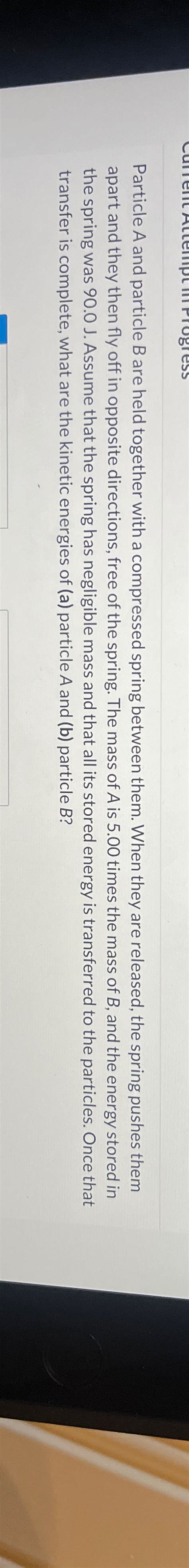 Solved Particle A And Particle B Are Held Together With A Chegg Com