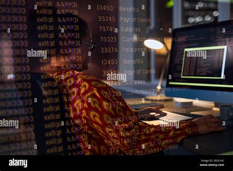 African American Programmer Working With Program Codes Till Late Night