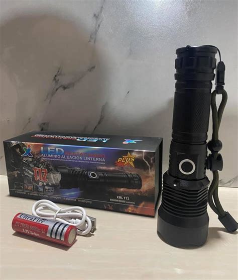 ไฟฉายแรงสูง ไฟฉายซูม หลอด Xml T12 P50 ความสว่าง 69000w ชาร์จไฟ 5 โหมดการทำงาน บอกสถานะของ