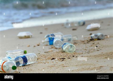 Plastic Bottles Thrown Onto The Beach By Ocean Currents Borneo Malaysia South East Asia Stock