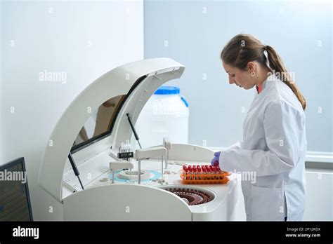 Woman Conducts Laboratory Diagnostics In The Testing Unit Stock Photo Alamy
