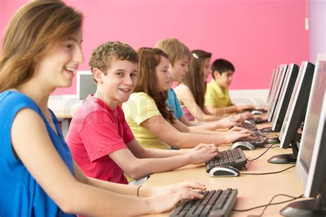Teenage Students In It Class Using Computers In Classroom Stock Image Teenage Students In It Class Using Computers In Classroom Stock Image