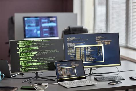Premium Photo Background Image Of Multiple Computer Screens With Code Lines At Desk