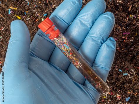 Microplastics In Soil A Test Tube With Soil Sample Soil Contaminated With Mineral