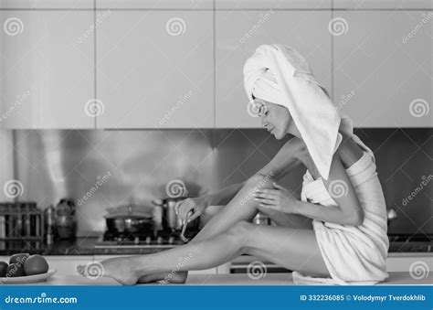 Woman Shaves Legs Hairy Legs Sexy Woman With Foam On Leg Hold Razor And Shaved Hair On Legs