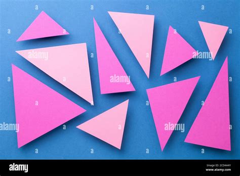 Abstract Composition Over Blue Paper Background With Pink Triangular Shapes Minimal Style Top