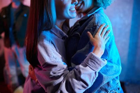 Premium Photo Hugging Female Friends