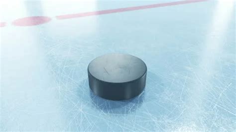Hockey Puck Sliding On Ice