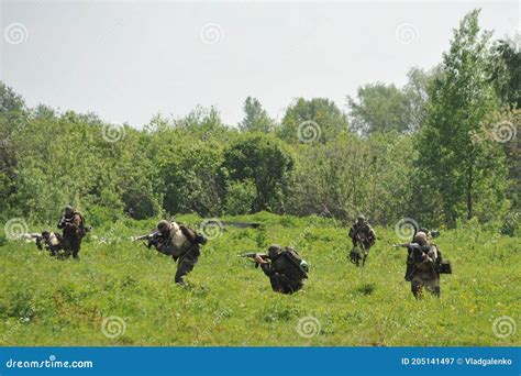 Soldiers Of The Special Forces Unit Work Out Actions In Combat At A