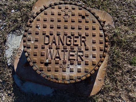 Hidden Dangers Beneath Caution Advised Stock Image Image Of Urban Manhole 370941391