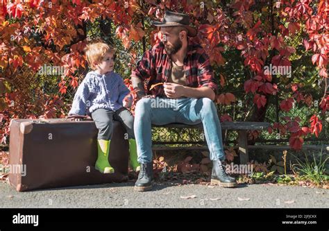 Cute Little Boy With His Father During Stroll In The Forest Dad And
