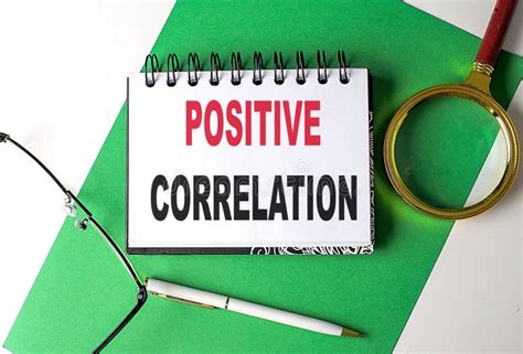 POSITIVE CORRELATION Text On Notebook On Green Paper Stock Photo Image Of Financial Positive