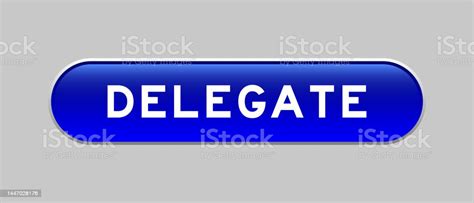 Blue Color Capsule Shape Button With Word Delegate On Gray Background