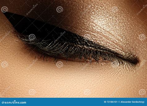 Cosmetics And Make Up Beautiful Female Eye With Black Liner Stock Image