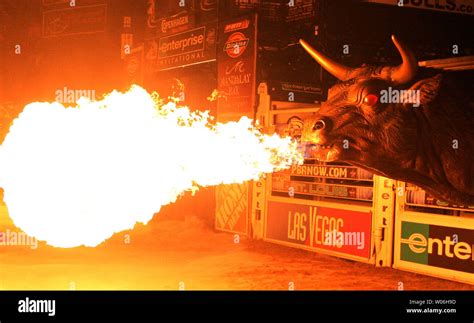 Flames Shoot From The Mouth Of A Display Bull During The Opening