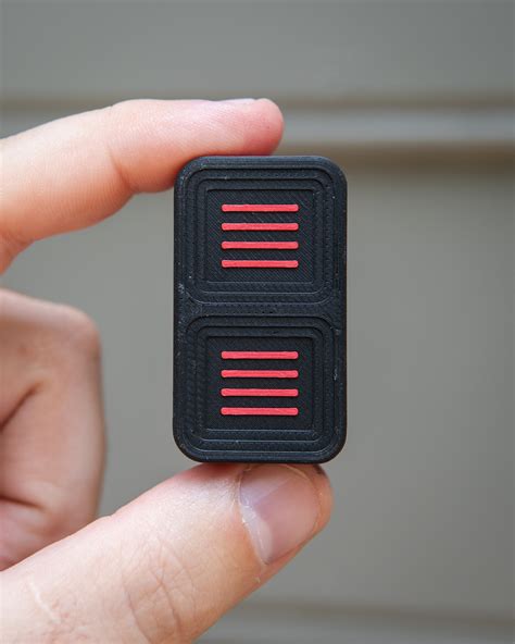 Delta Tile Fidget Slider Makers Choice Black And Red Plastic Novel