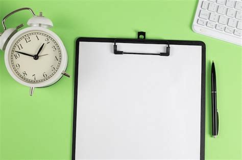 Premium Photo A Notepad With A Blank Sheet Of Paper And A Pen Next To It On The Table