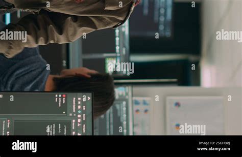 Vertical Video Software Engineers Analyzing Source Code And Database