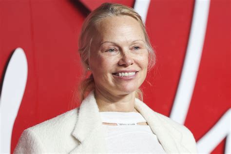 Pamela Anderson Makes Makeup Free Appearance On 2023 Fashion Awards Red