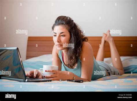 Beautiful Woman Using Notebook At Home Stock Photo Alamy