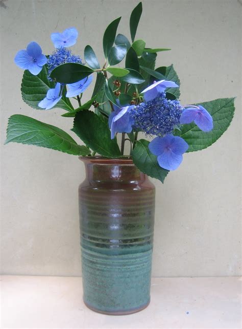Jim Fineman Green And Rust Vases