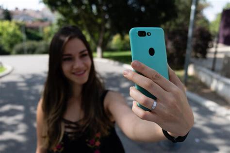 Premium Photo Woman Taking Selfie On Mobile Phone