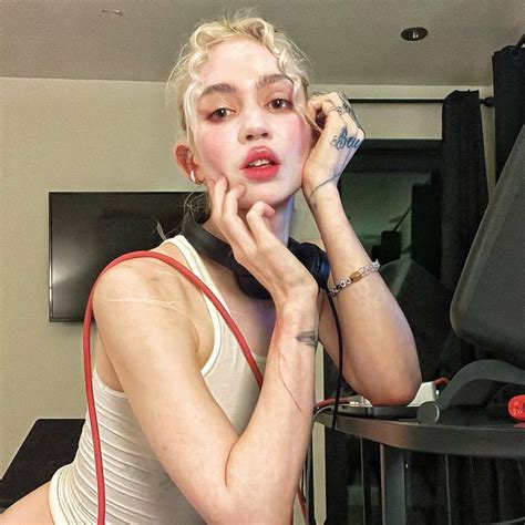 Grimes Unveils Large Face Tattoo Associated News Agency