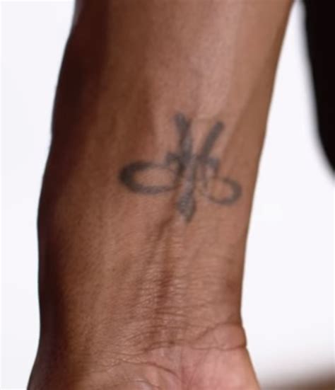 Trey Songz Feather Tattoos