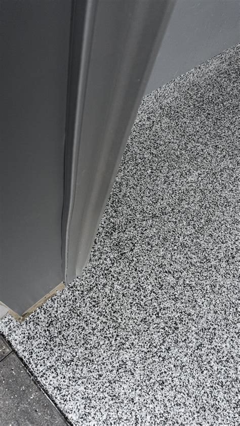 Luxury Garage Renovation With Polyaspartic Flake Coating