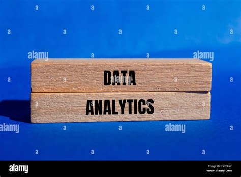 Data Analytics Message Written On Wooden Blocks With Blue Background