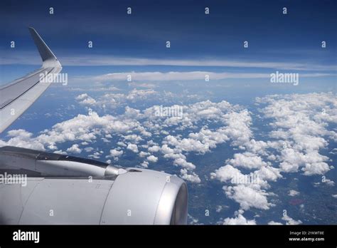 Boeing 737 Max Airplane View Of Jet Engine Wing And The Earths Horizon Flying Above The