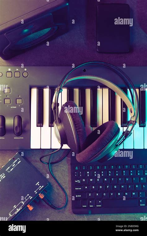 Keyboard Or Synthesizer With Headphones And Sound Card Computer Recording And Music Production