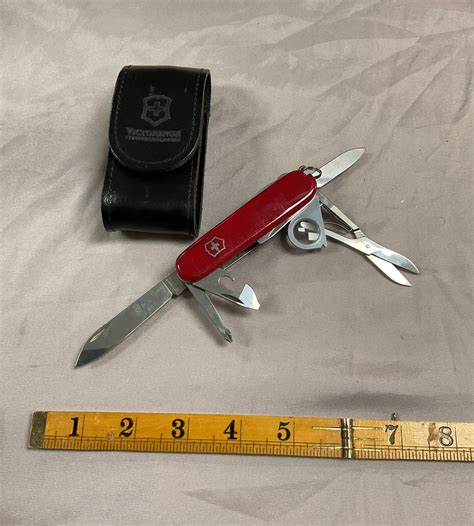 Victorinox Swiss Army Knife In Leather Belt Pouch Badgers Auctions
