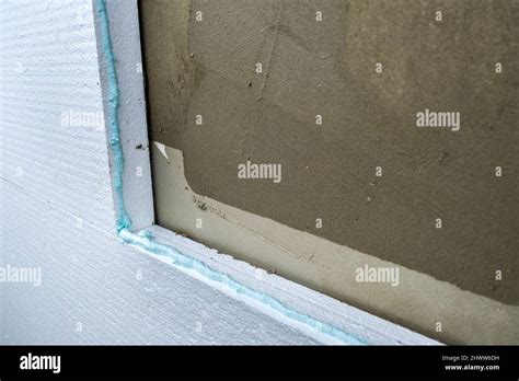 Installation Of Styrofoam Insulation Sheets On House Facade Wall For Thermal Protection Stock